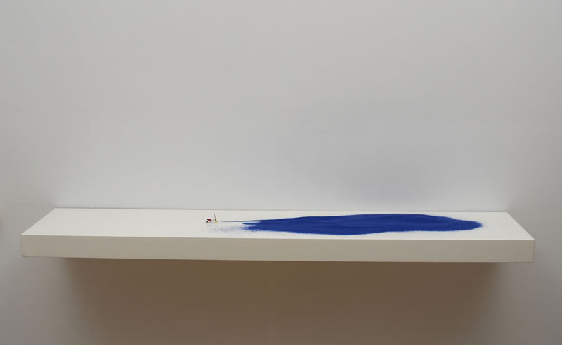 Liliana Porter - Forced Labor (blue sand) II